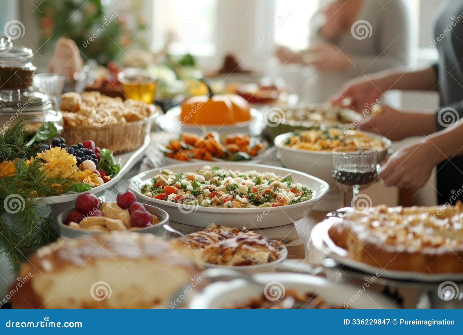 A Table Spread with Various Dishes and Desserts at a Gathering Stock ...