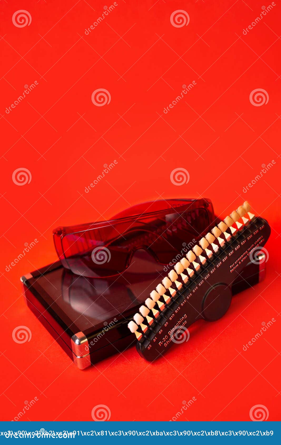 Table of Teeth Color. Scale on a Red Background Close-up Stock Image ...