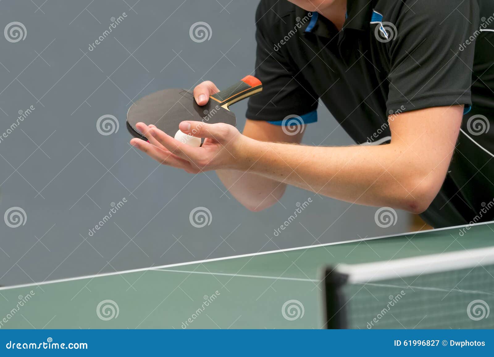 Table Tennis Player Serving Stock Image - Image of senior, hand: 61996827