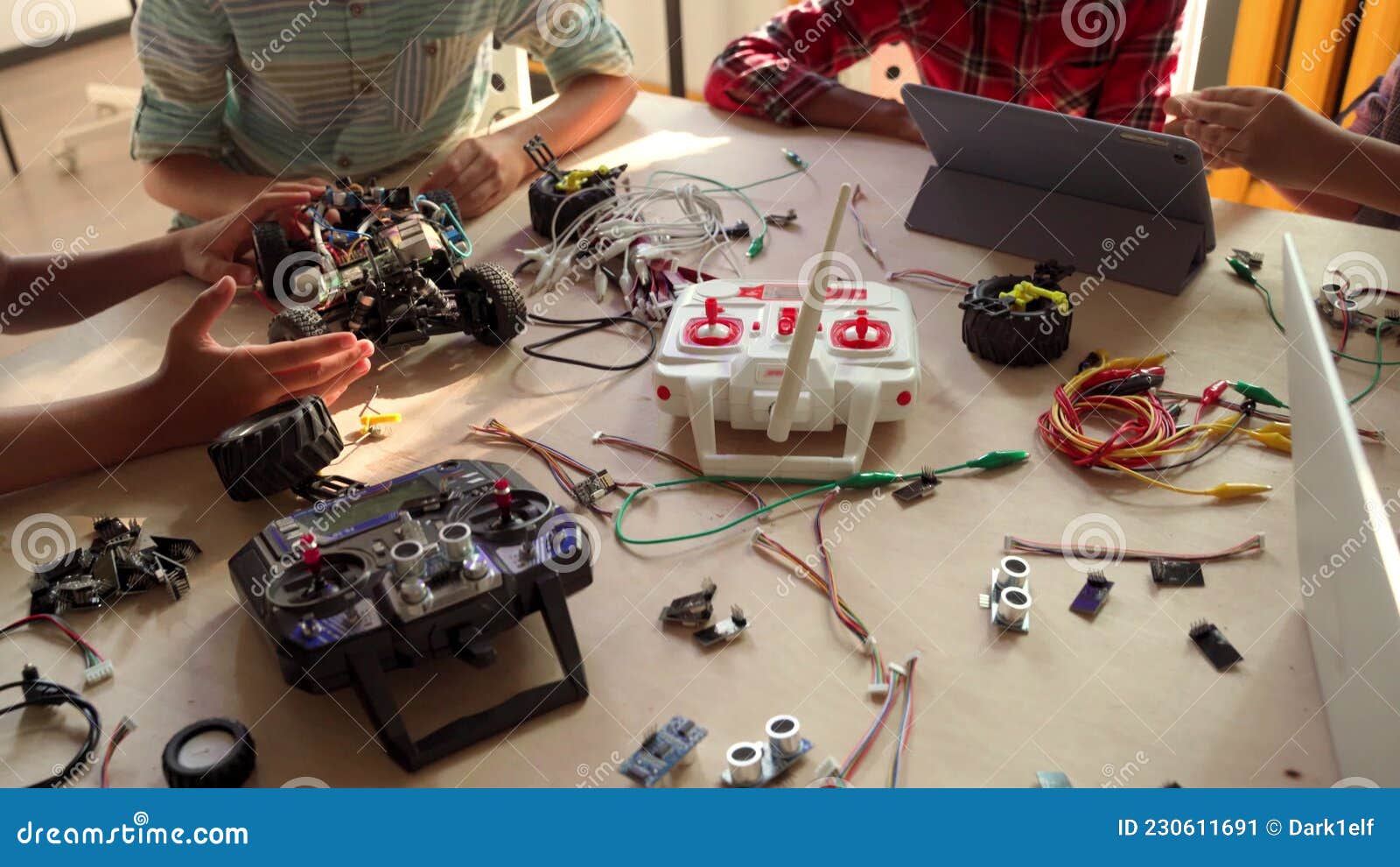 Group of Multiethnic Schoolkids in Classroom Building Robot. Table Top ...