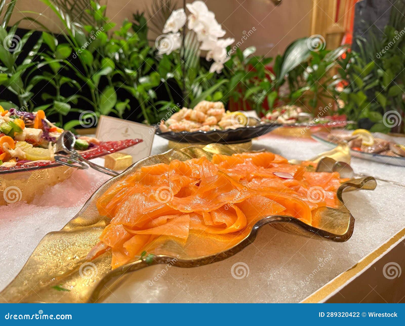 A Table Topped with Many Assorted Foods and Drinks of Different Colors ...