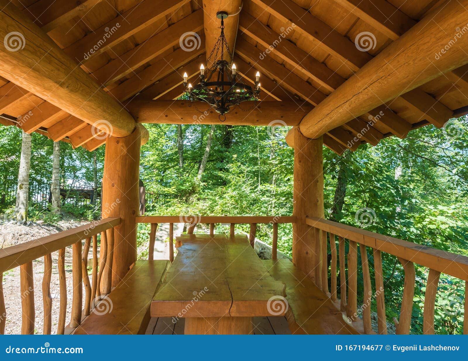 A Table and Two Benches Made of Large Solid Wood in Log Cabin Stock ...