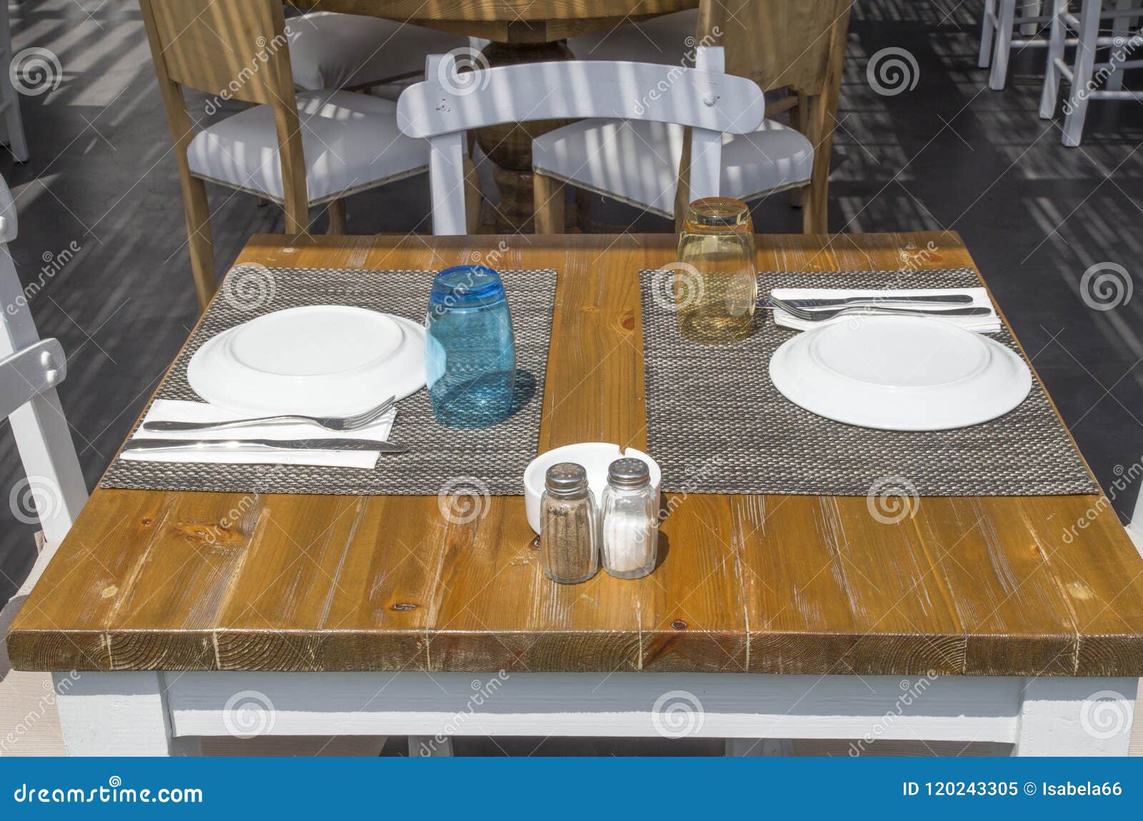 Table with Two Empty Inverted Plates in a Restaurant Stock Image ...