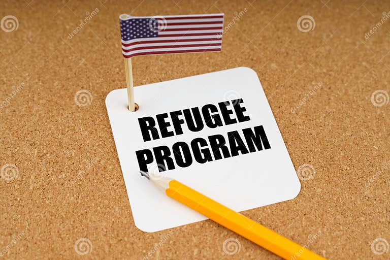 On the Table is the US Flag, a Pencil and a Sheet of Paper with the ...