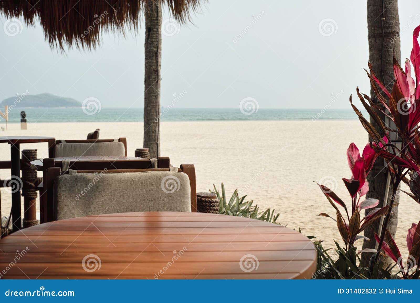 Tables on beach stock photo. Image of tranquil, thatch - 31402832