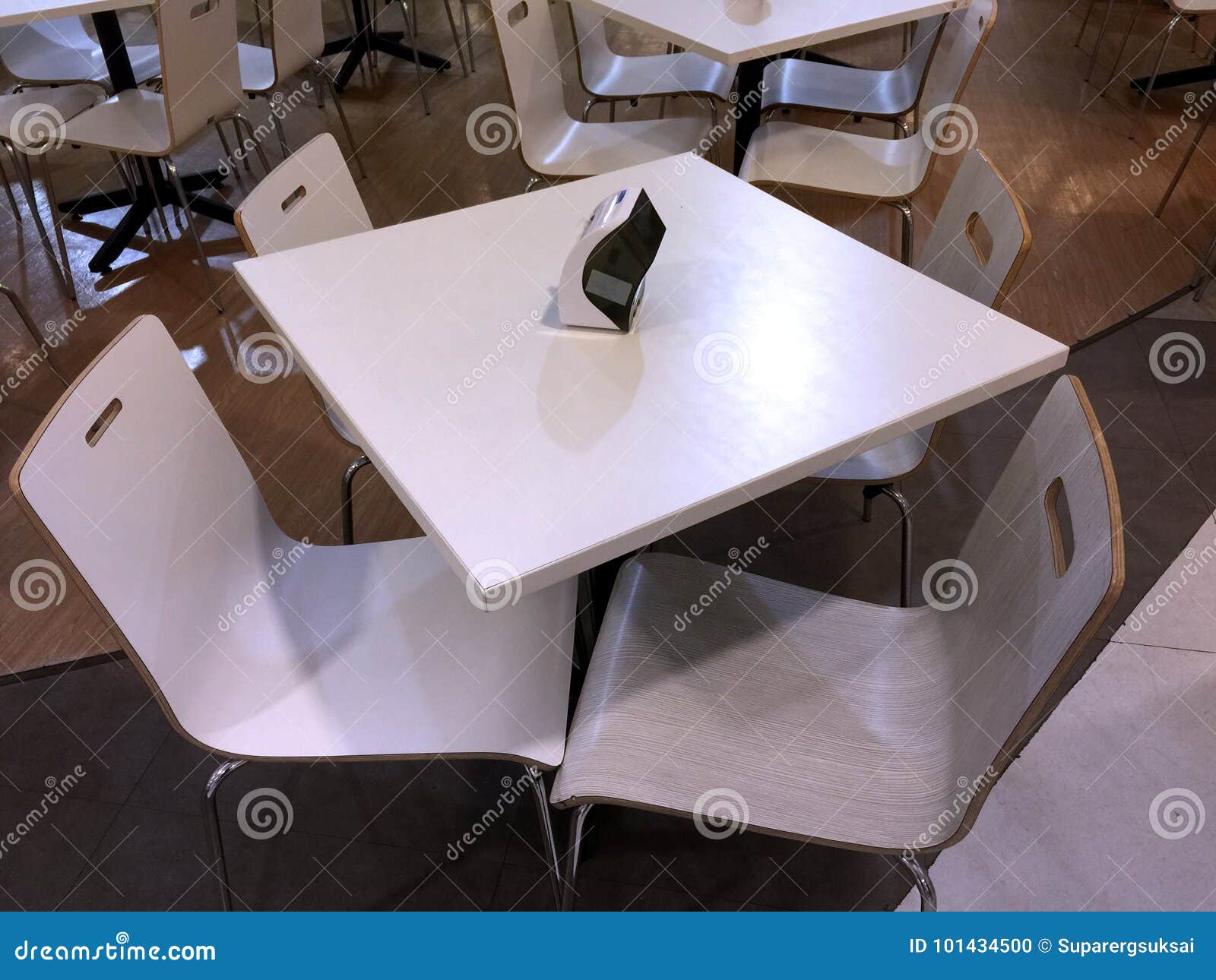 Tables and Chairs Line Up stock photo. Image of shop - 101434500