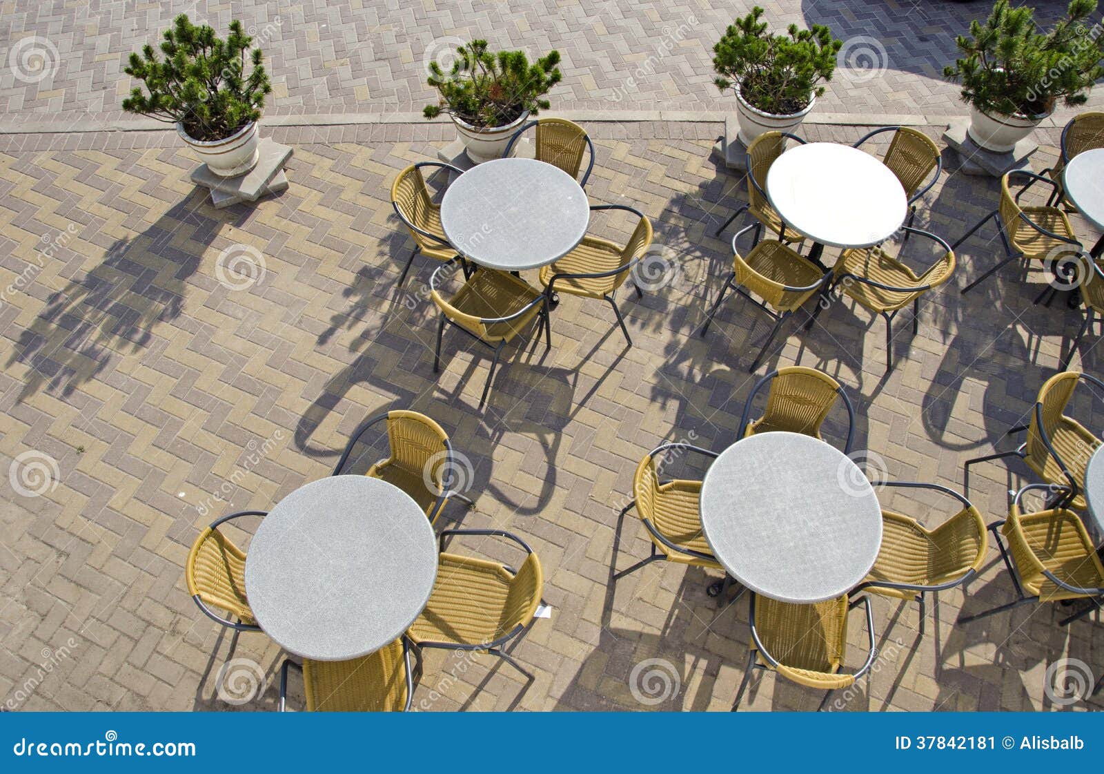 Tables and Chairs in Street Cafe on Pavement Stock Image - Image of ...