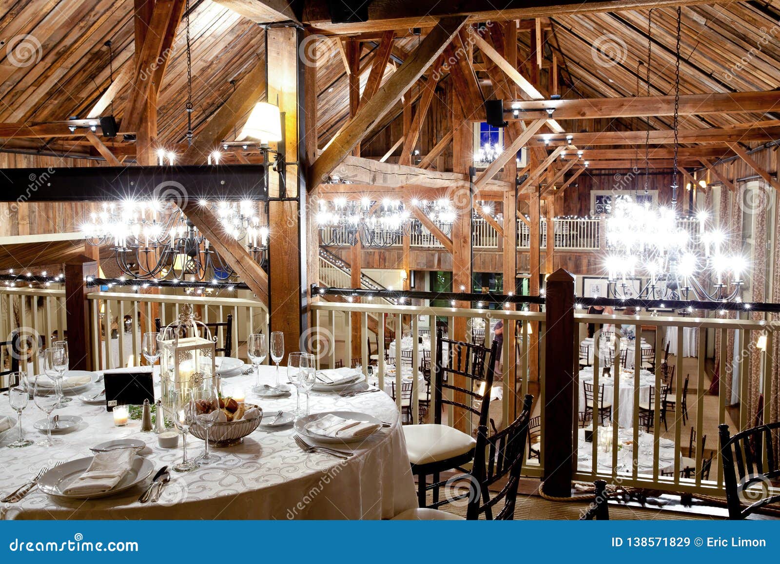Tables Set Inside a Dark Barn during a Wedding Reception Stock Image ...