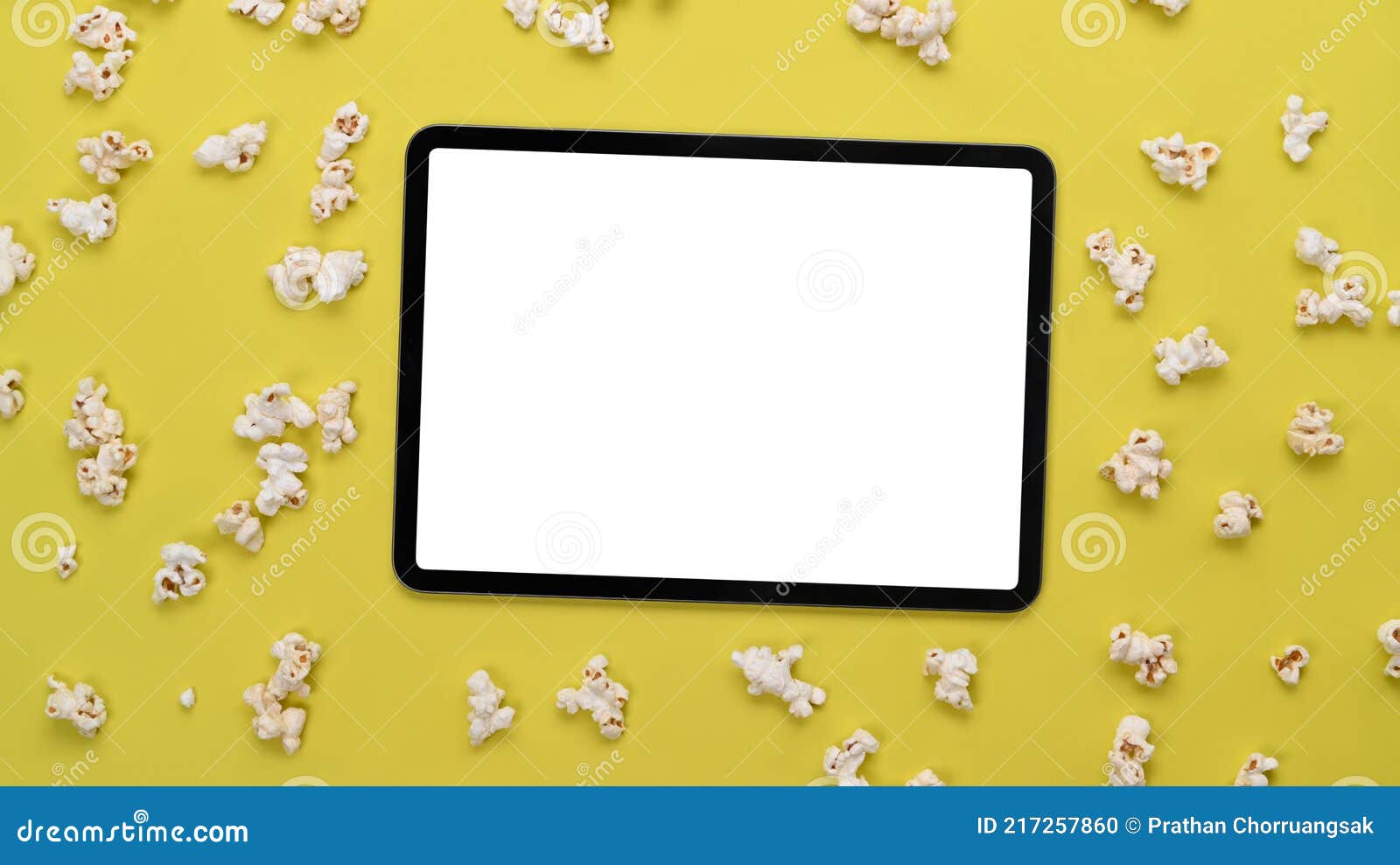 Digital Tablet Blank Screen with Popcorn on Yellow Background. Stock ...