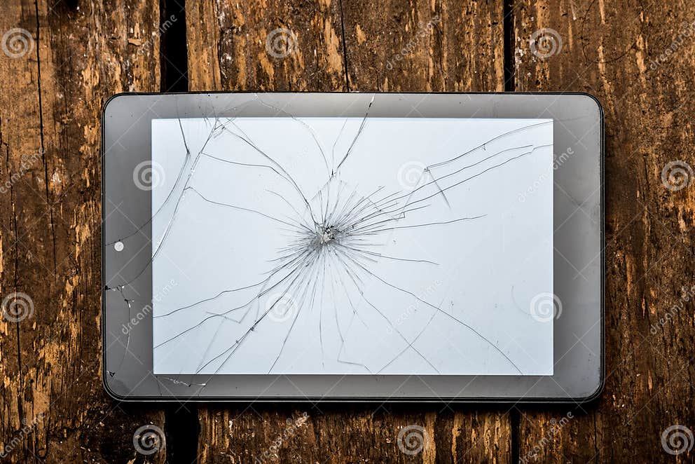 Tablet with broken glass stock photo. Image of damage - 79594356