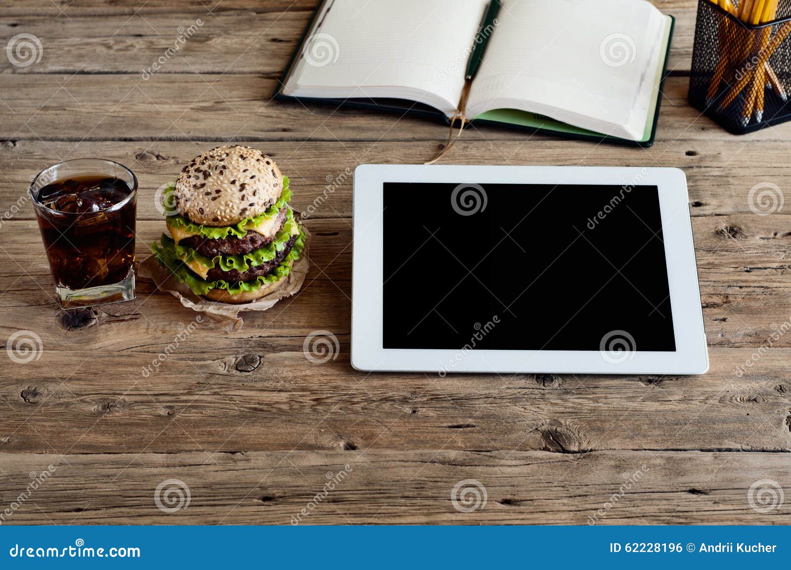 Tablet Computer with a Hamburger and a Glass of Cola Stock Photo ...