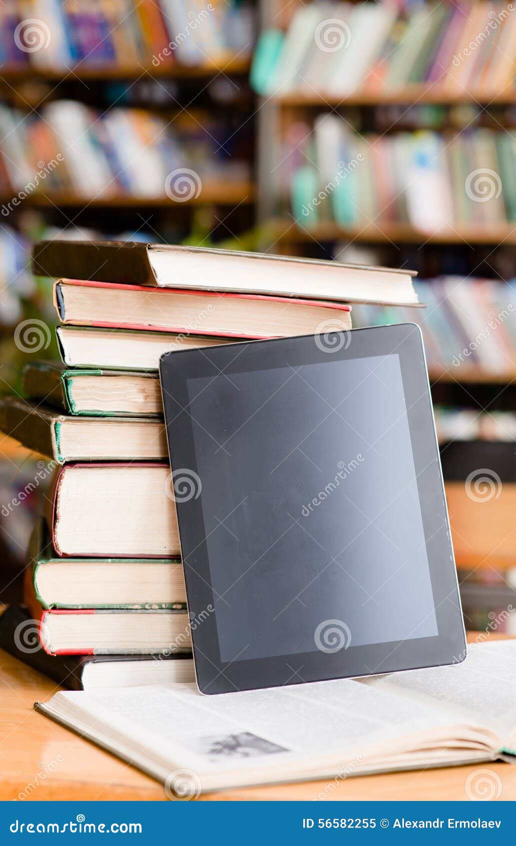 Tablet Computer in Library Near Books Stock Image - Image of page ...