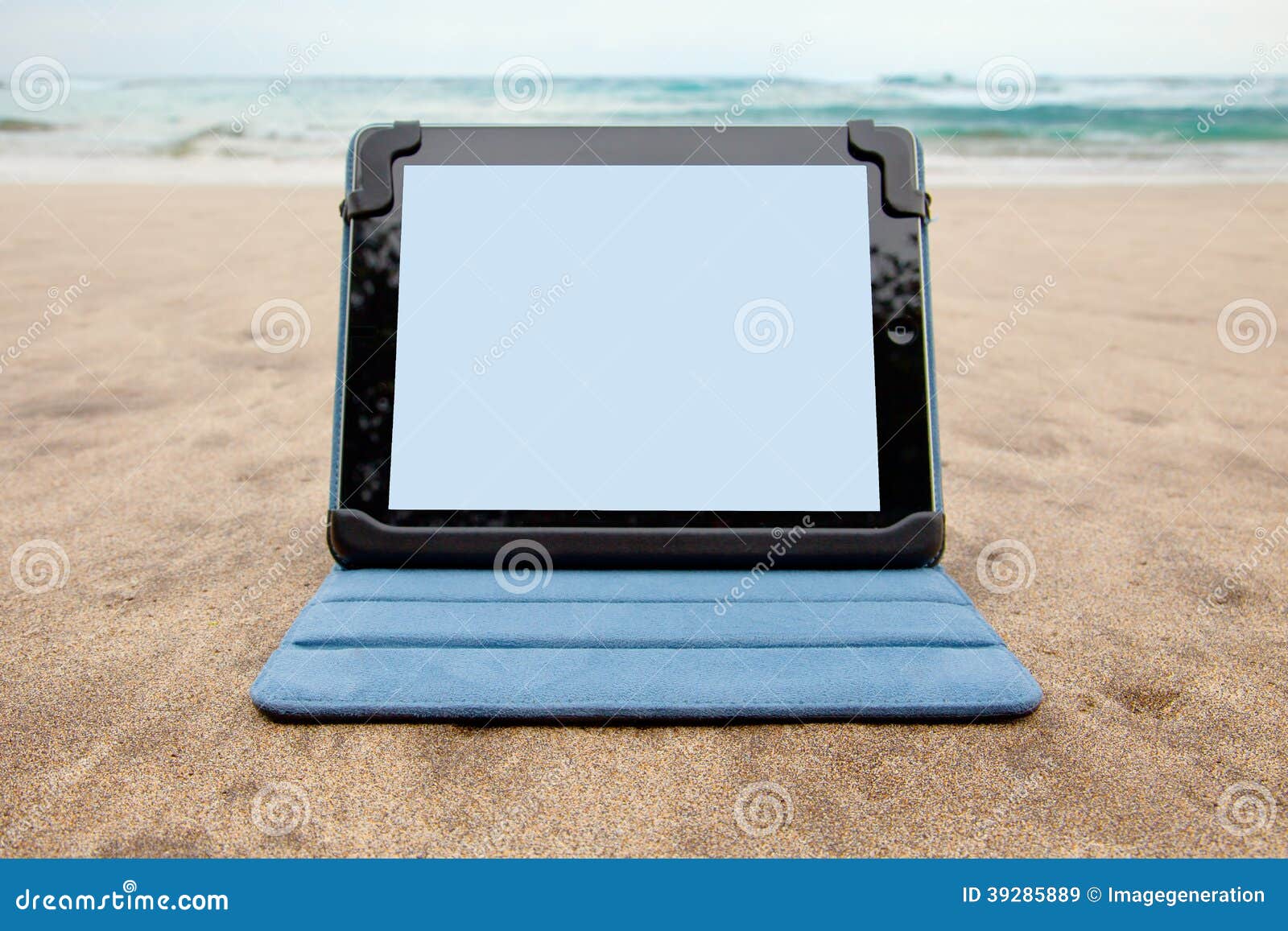 Tablet device on beach stock image. Image of technology - 39285889
