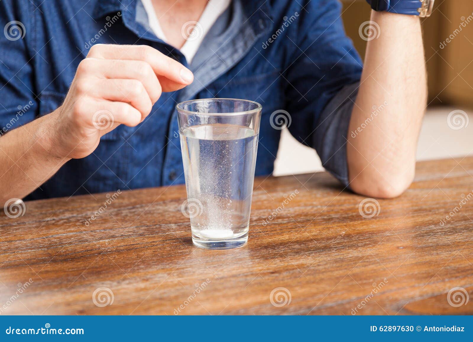 Tablet Dissolving in a Glass of Water Stock Photo - Image of space ...