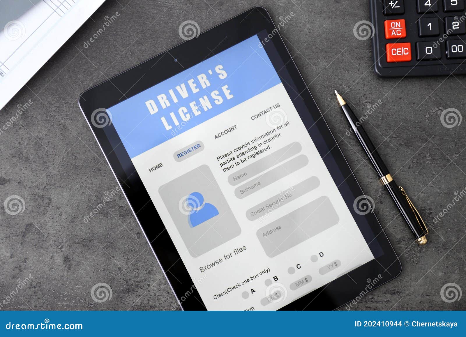 Tablet with Driver`s License Application Form, Pen and Calculator on ...