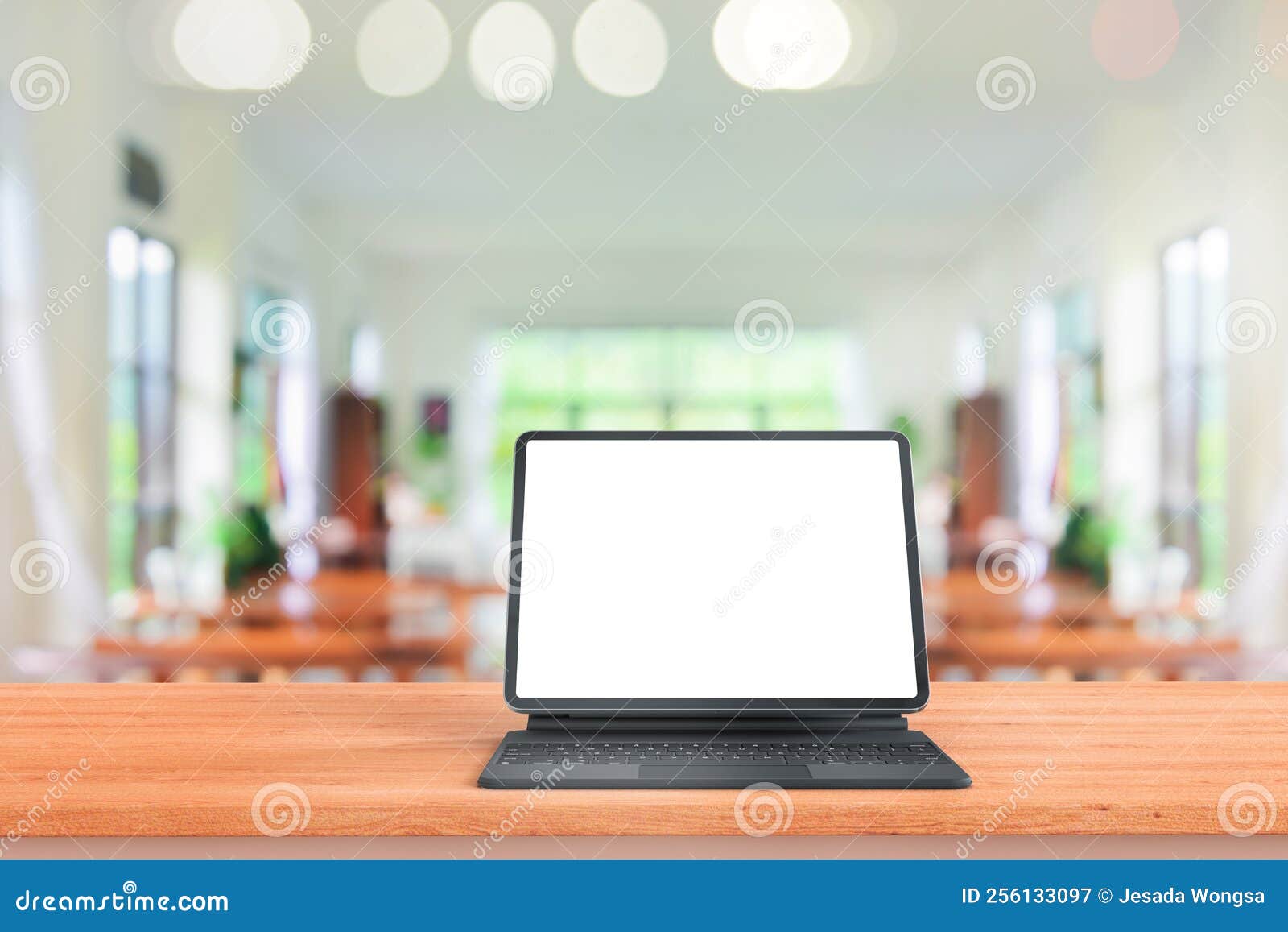 Digital Tablet Mock Up Placed on Wooden Table in Blurred Coffee Shop or ...