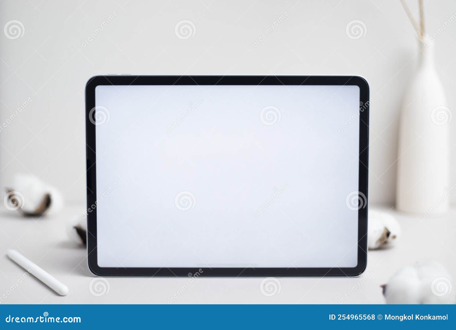 Tablet Empty White Screen with Pencil and Cotton Flower on White ...