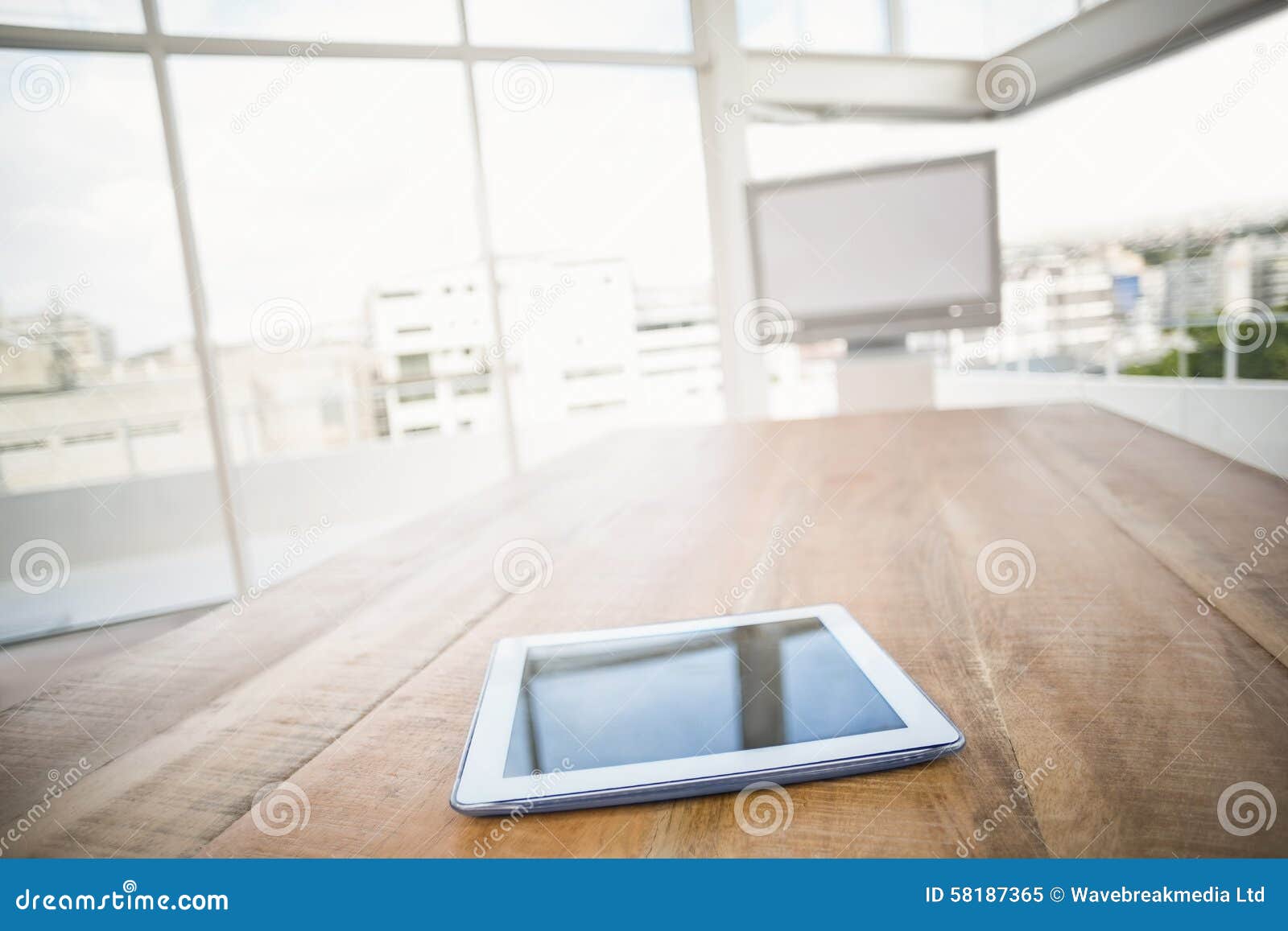Tablet in Front of Meeting Room Stock Image - Image of digital ...