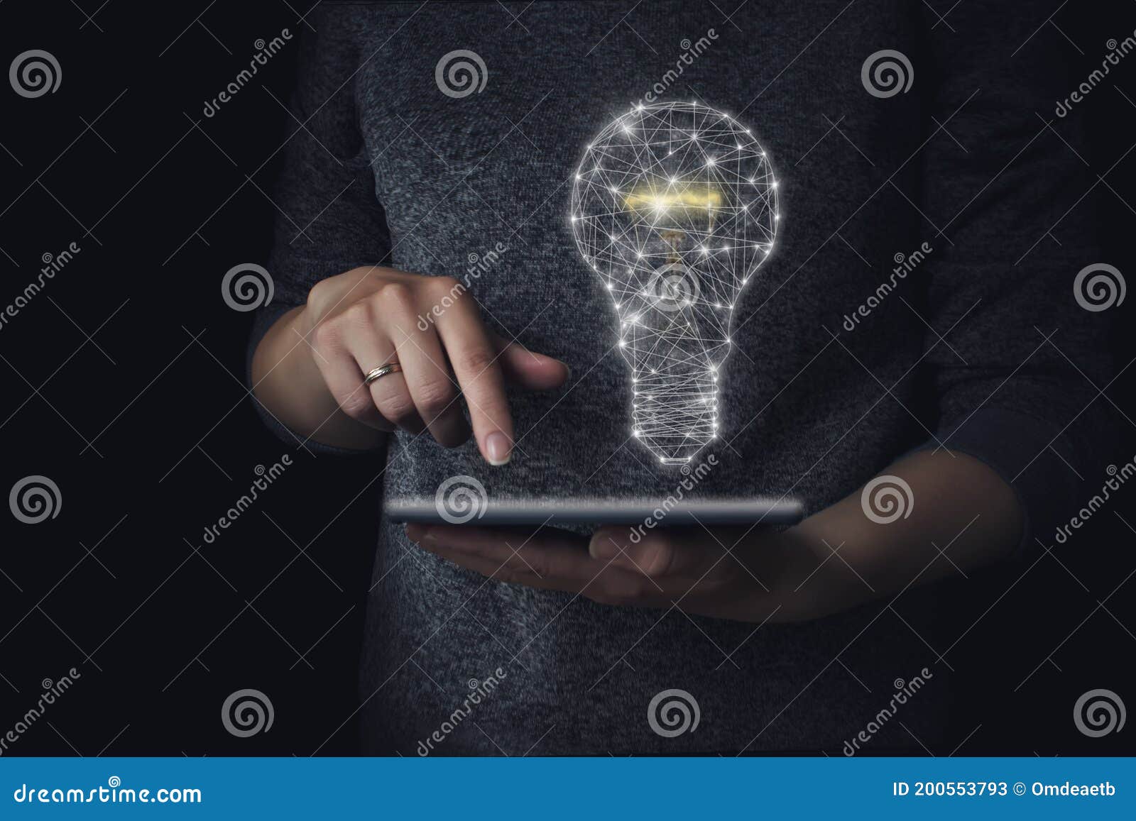 Tablet in Hand with Light Bulp. Network Bright Idea with Light Bulb ...