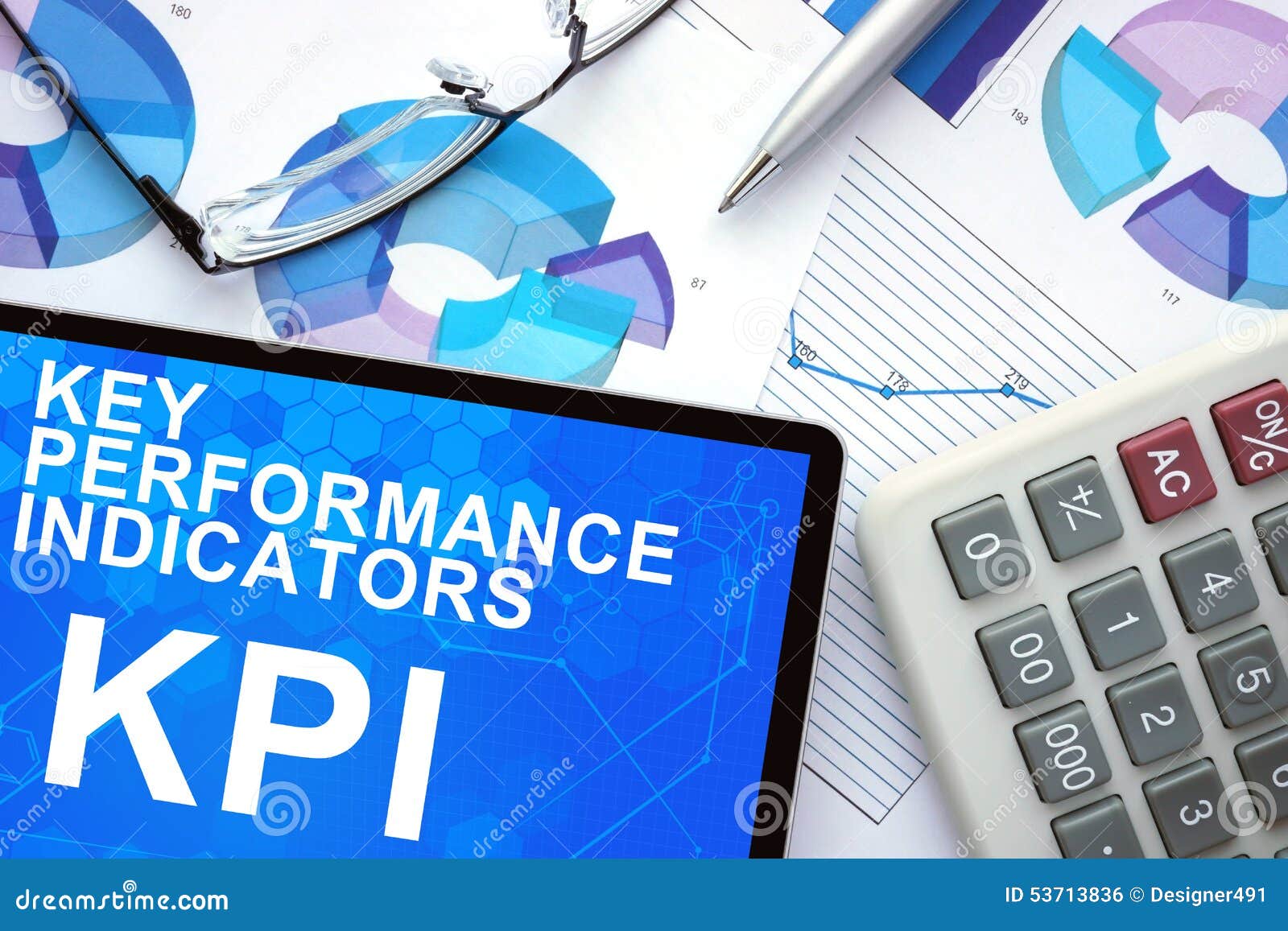 Tablet with Key Performance Indicators , KPI , Graphs. Stock Photo ...