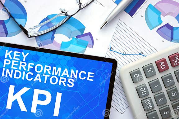 Tablet with Key Performance Indicators , KPI , Graphs. Stock Photo ...
