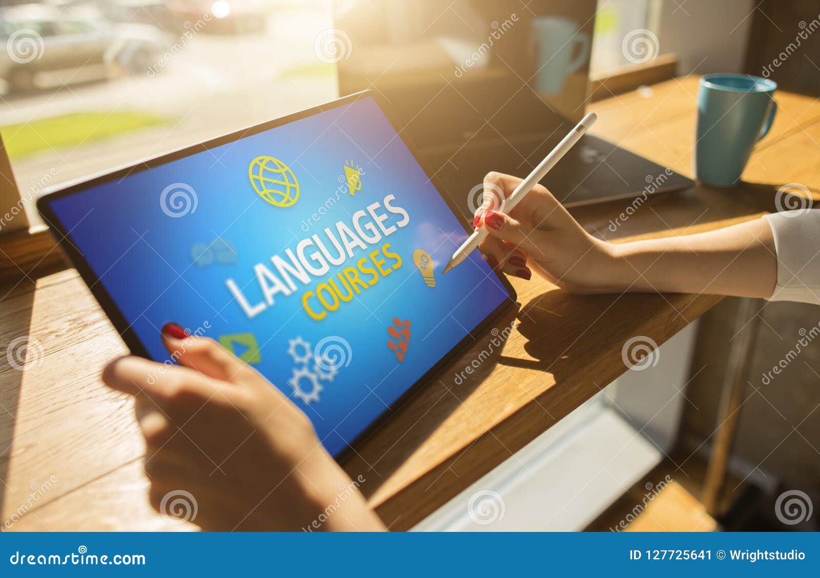 Tablet with Languages Courses Text and Icons on Screen. English ...