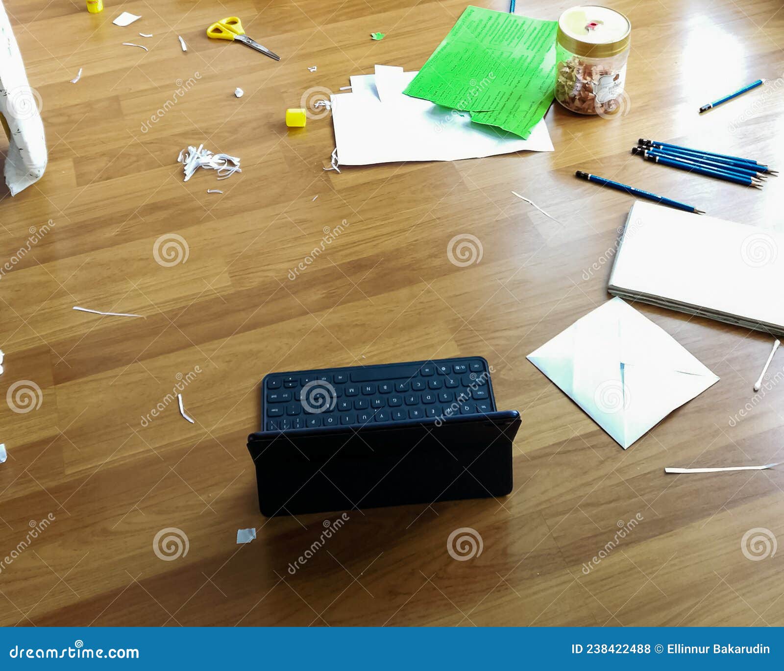 Tablet Laptop Computer on the Floor with Messy Items. Student Working ...