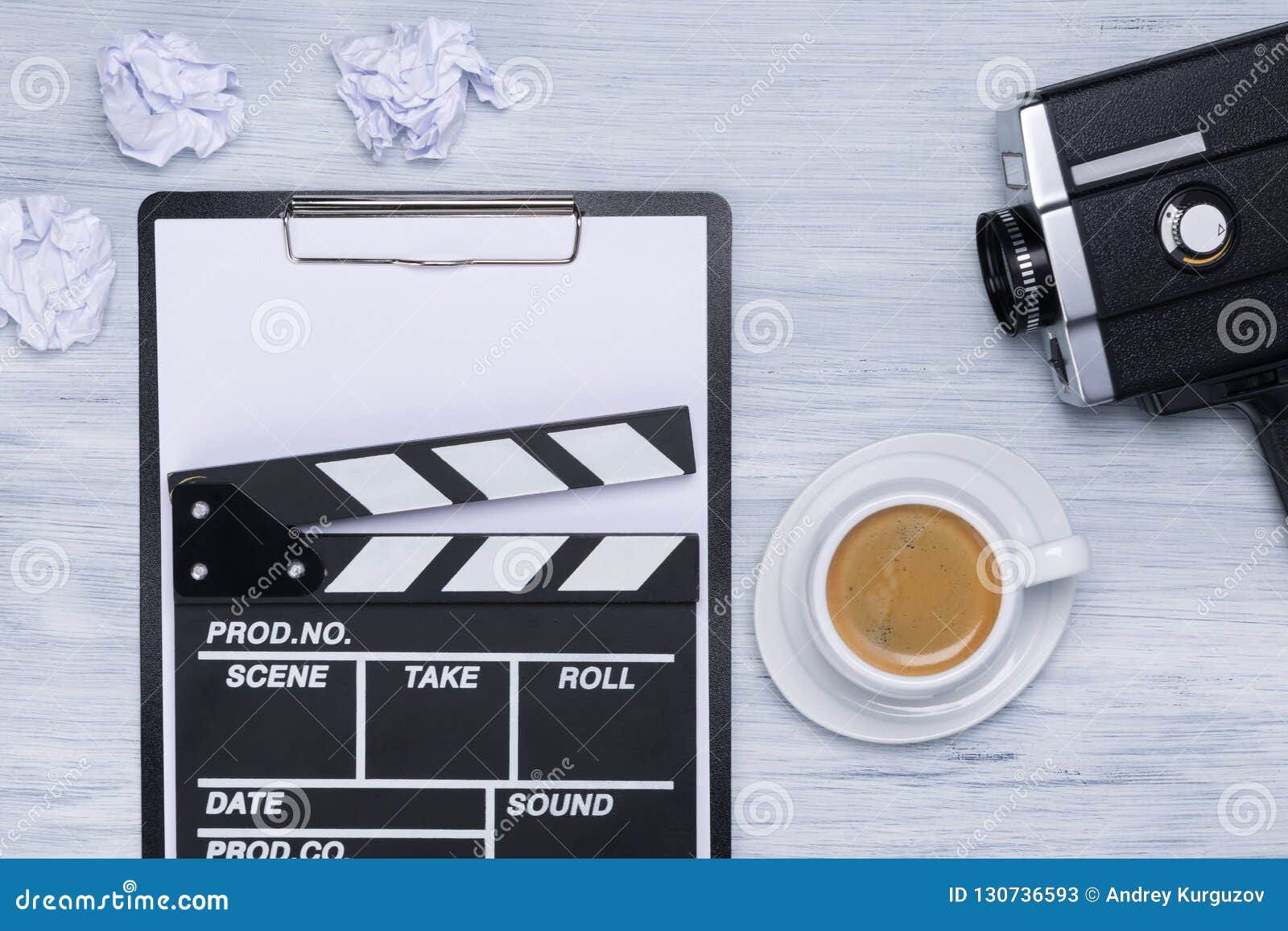 A Tablet for a Movie Script and a Cup of Coffee on the Director`s Table ...