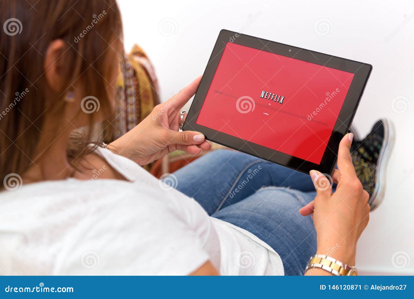 Tablet with Netflix Loading Screen. Young Woman. Editorial Photo ... Tablet with Netflix Loading Screen. Young Woman. Editorial Photo ...