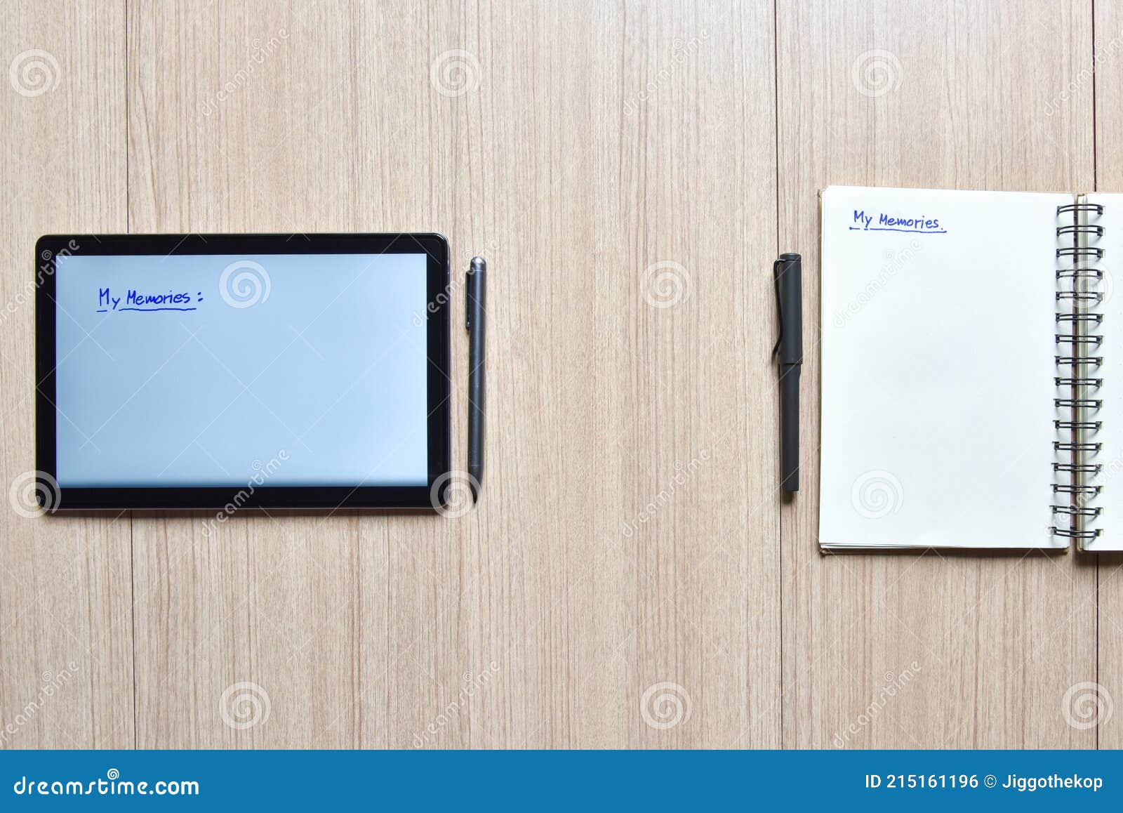 A Tablet and Notebook with Pens on Wood Table Stock Photo - Image of ...