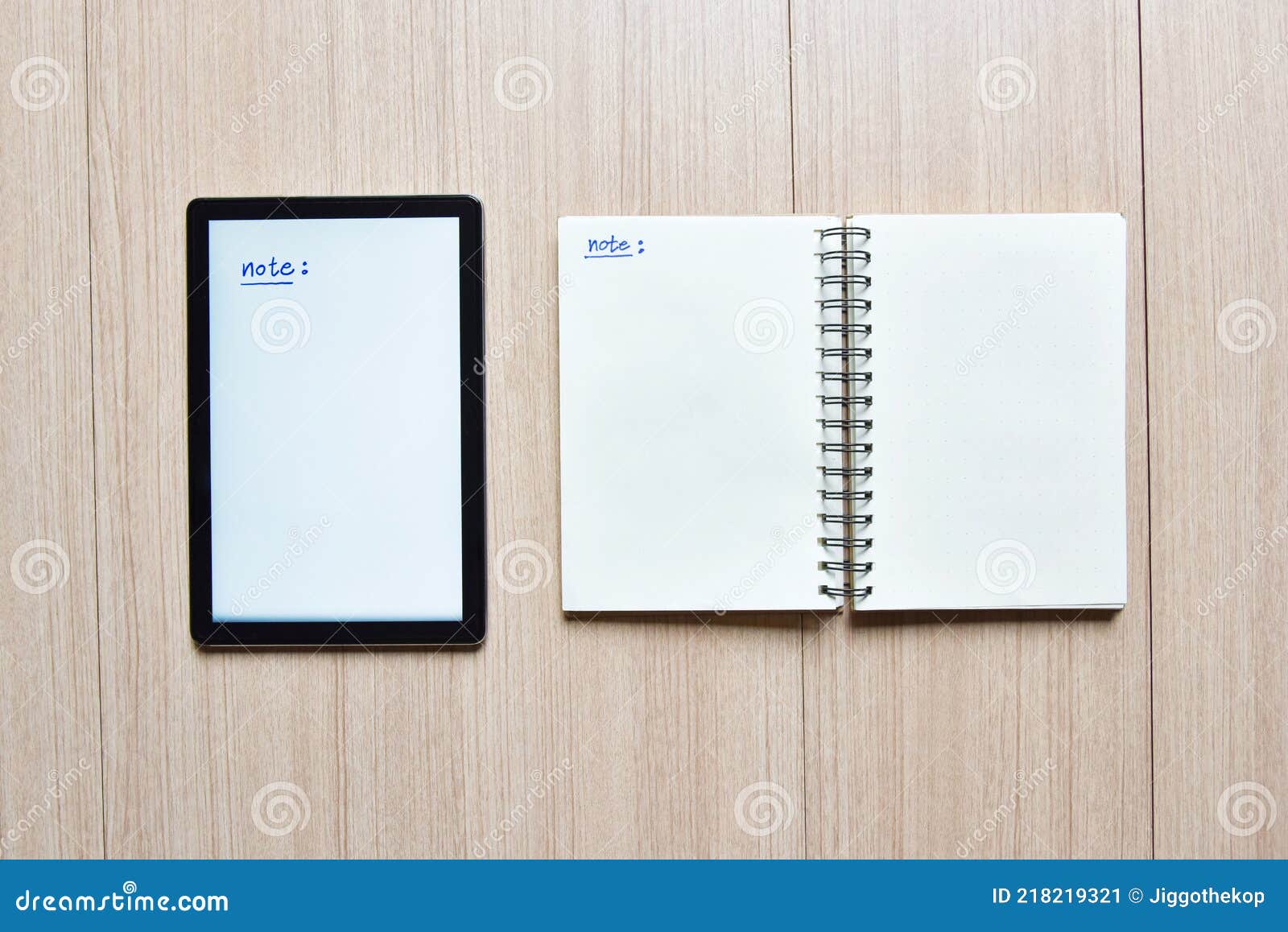 A Tablet and Notebook on Wood Table,old and New Style of Technology To ...