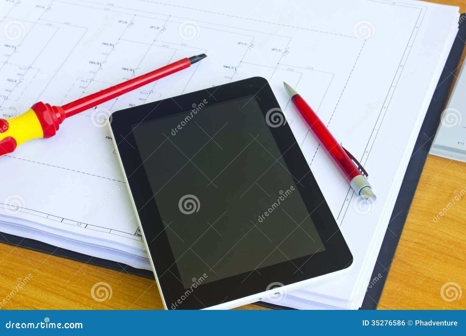 Tablet Over Engineering Diagram Stock Photo - Image of headline ...