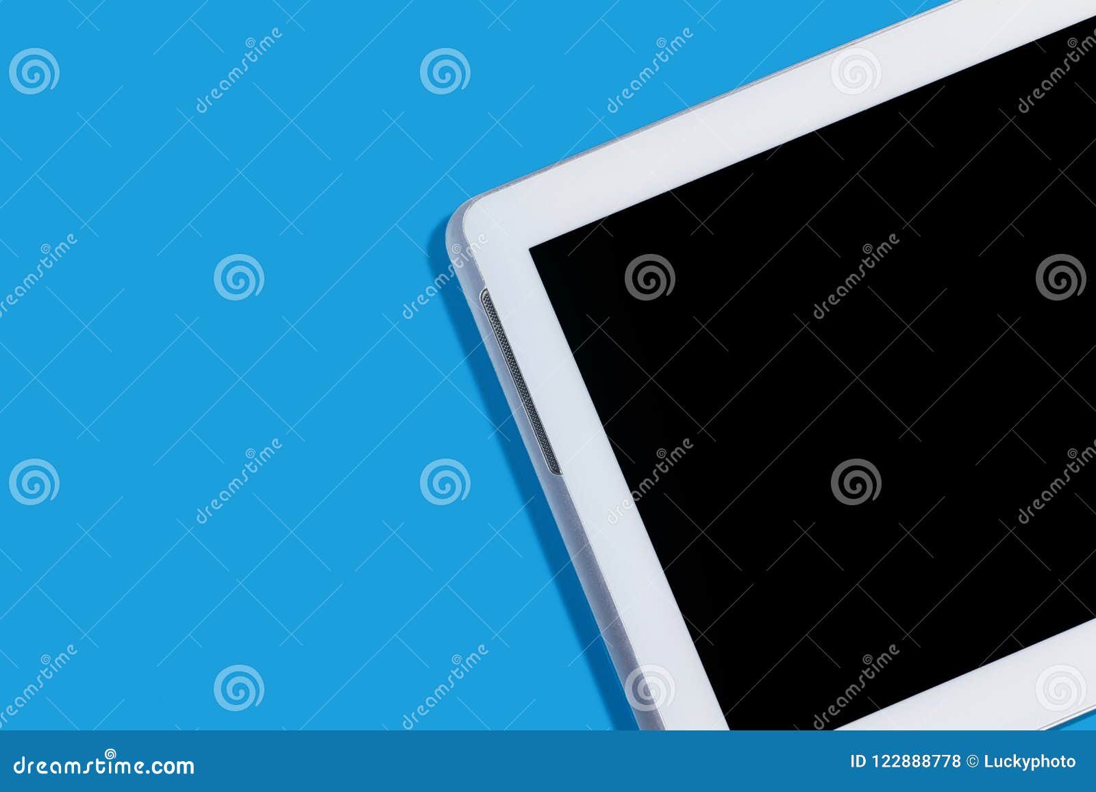 Tablet Pc on a Blue Surface Stock Photo - Image of electronics ...