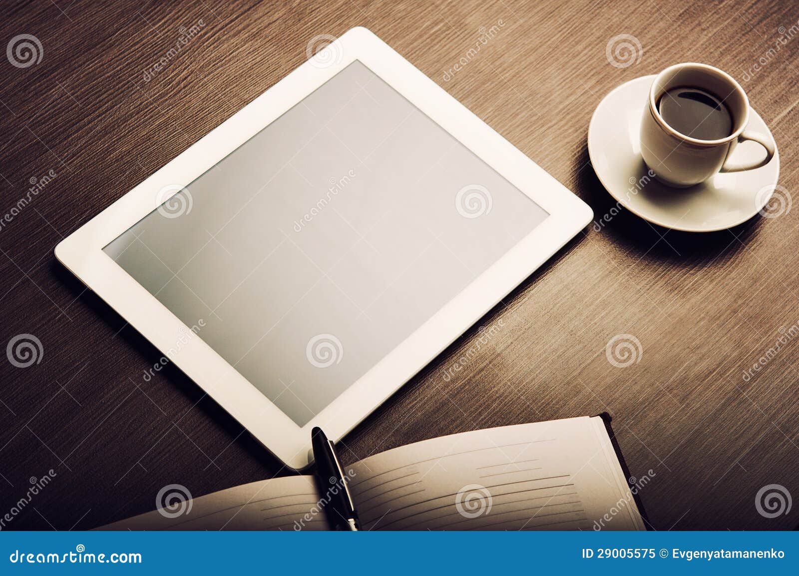 Tablet Pc and a Coffee and Notebook with Pen on the Office Desk Stock ...