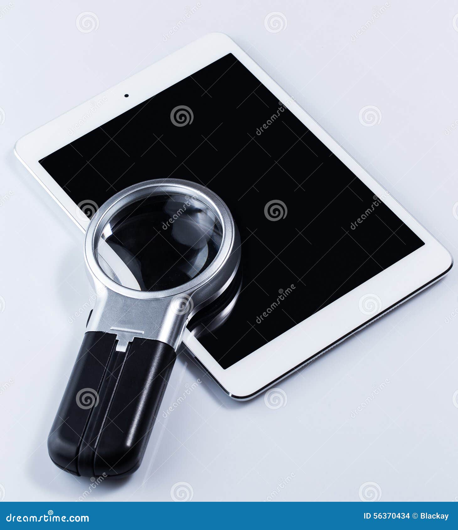 Tablet pc and magnifier stock photo. Image of information - 56370434