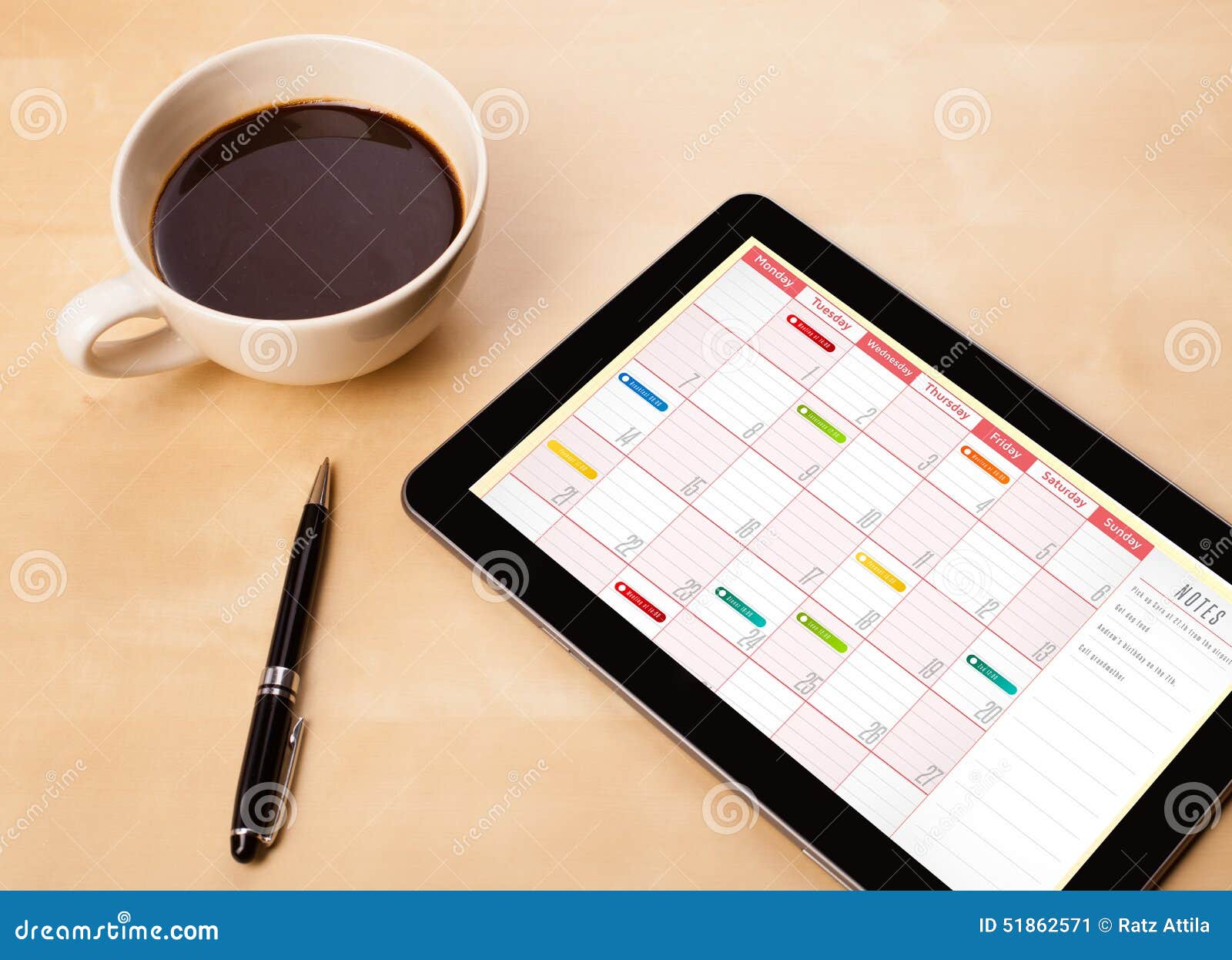 Tablet Pc Showing Calendar on Screen with a Cup of Coffee on a D Stock ...