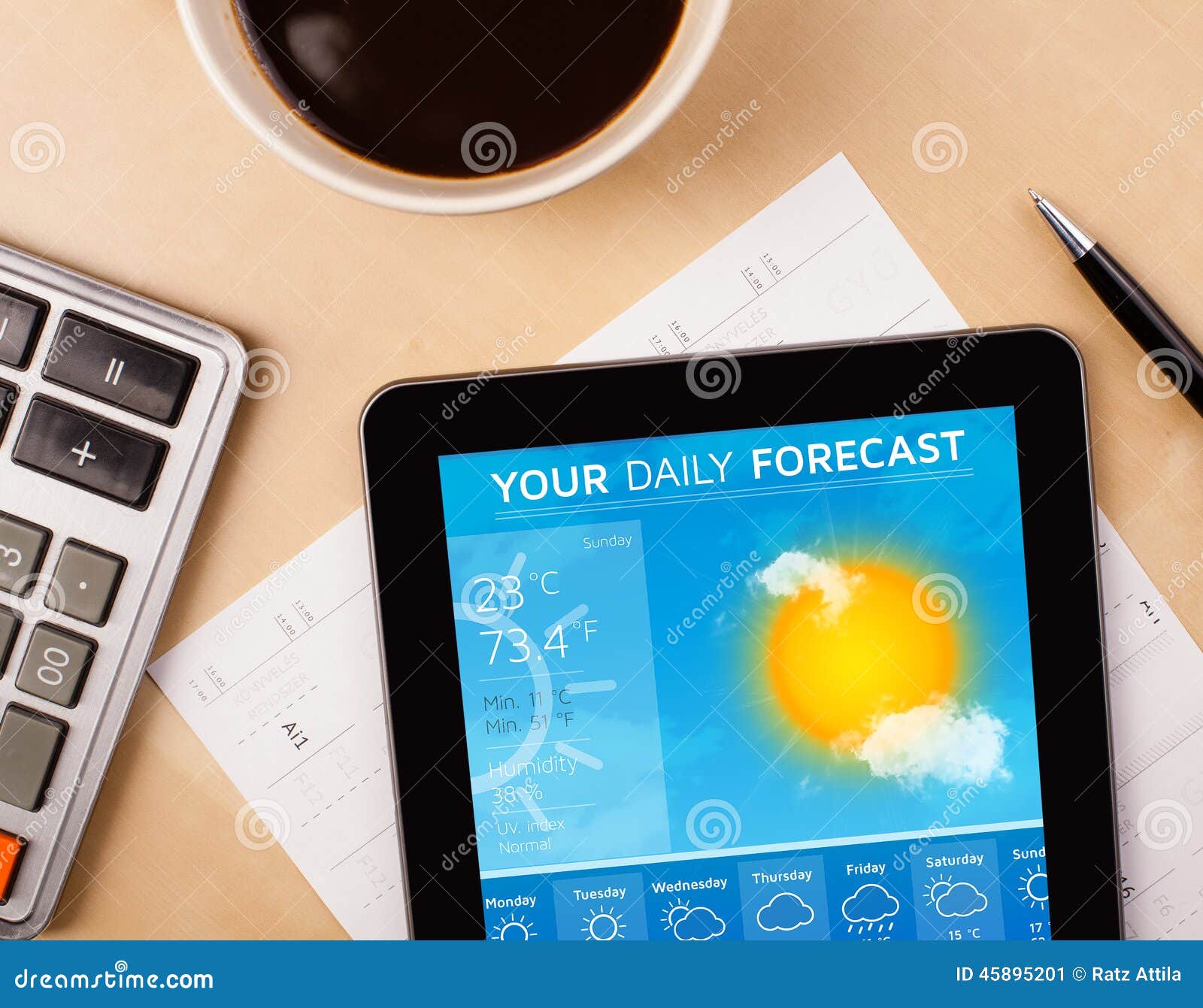 Tablet Pc Showing Weather Forecast on Screen with a Cup of Coffee on a ...