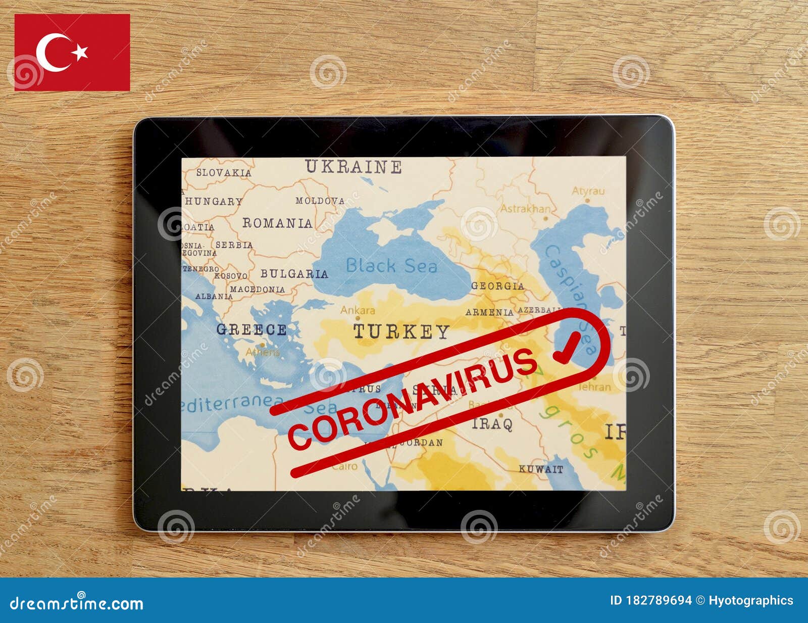 A Tablet PC Which is Displayed with Map of Turkey and Coronavirus Text ...