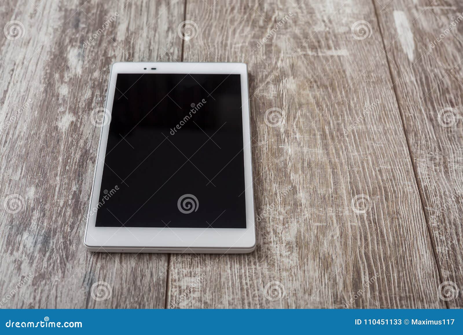 Tablet pc on a wood table stock image. Image of desk - 110451133