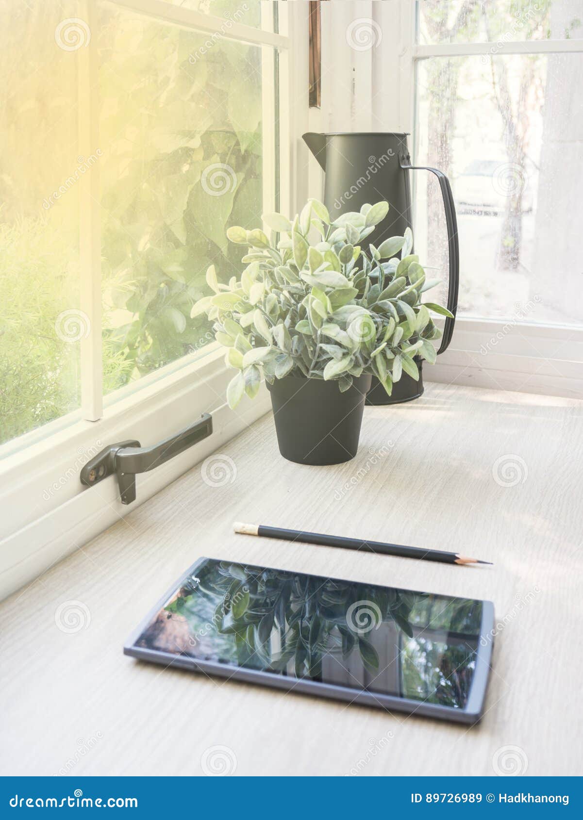 Tablet and Pencil Near Window at Coffee Shop Corner Stock Image - Image ...