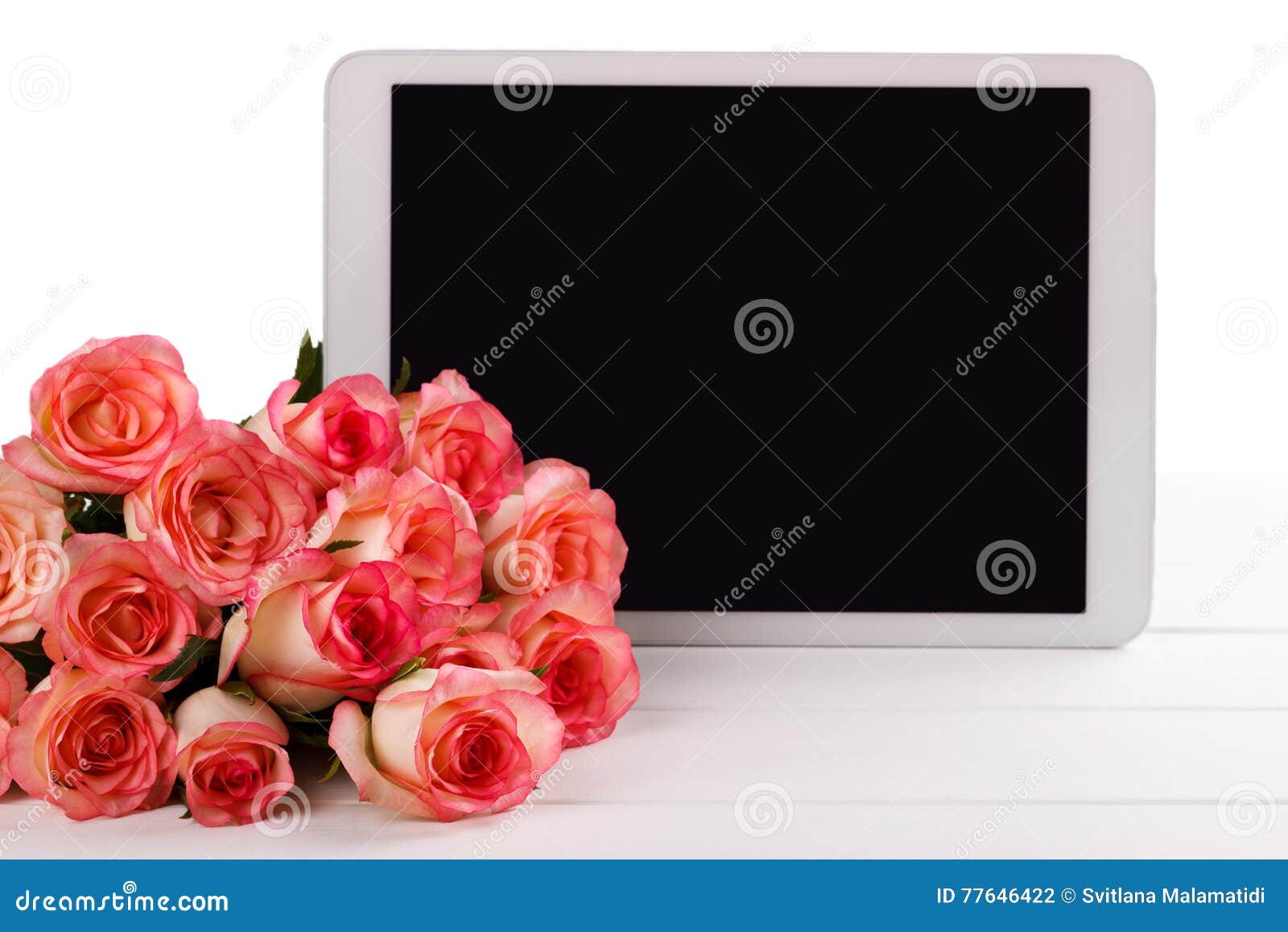 Tablet and pink roses stock photo. Image of design, frame - 77646422