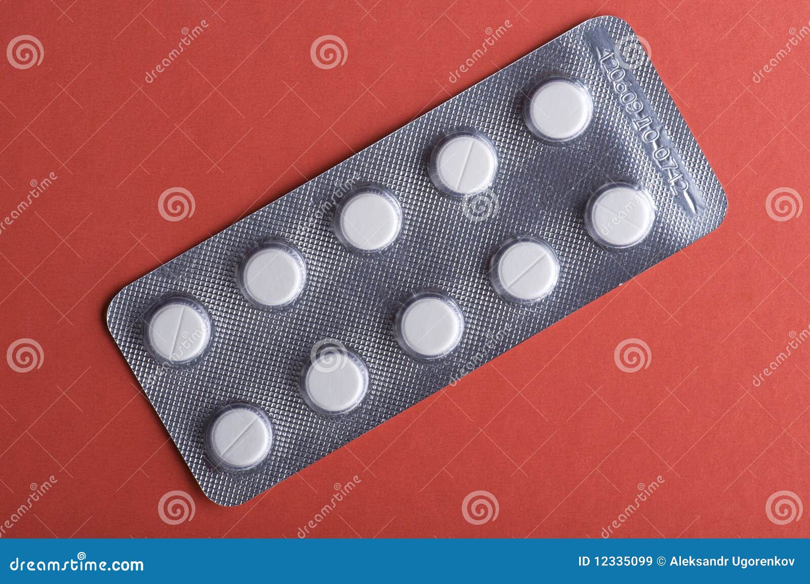 Tablet on red closeup stock image. Image of pain, pill - 12335099