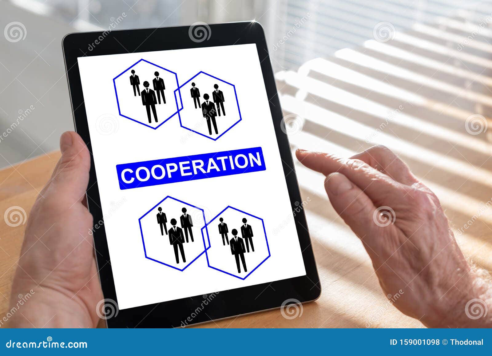 Cooperation Concept on a Tablet Stock Photo - Image of application ...