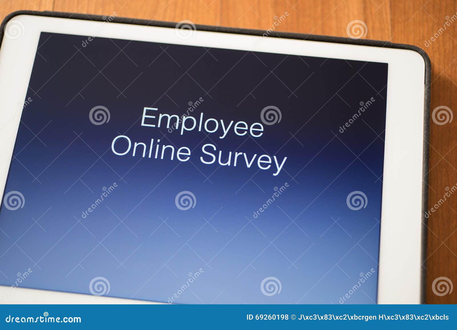 Tablet on Table with Online Employee Survey Stock Photo - Image of ...