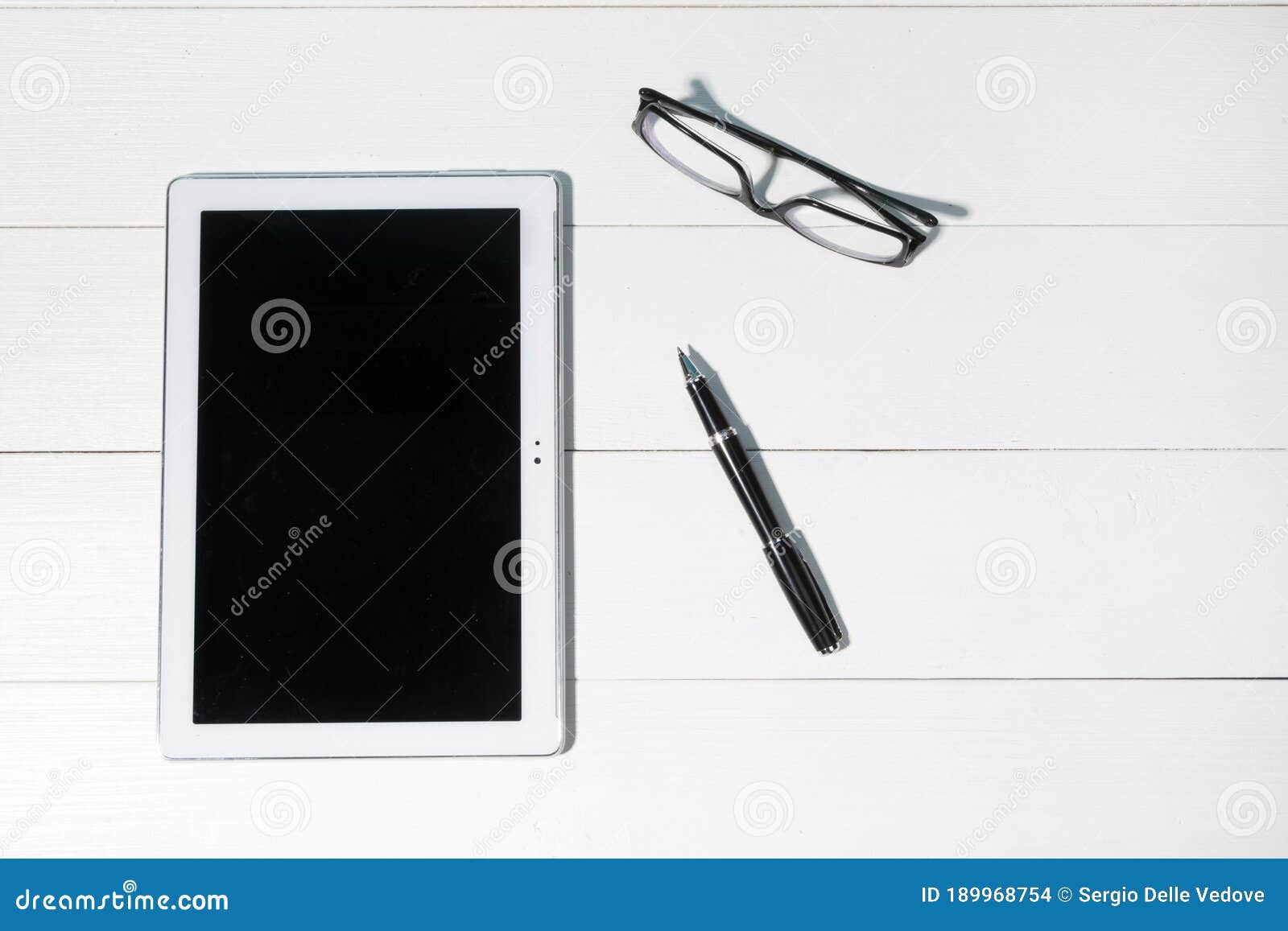 A tablet on the table stock photo. Image of message - 189968754