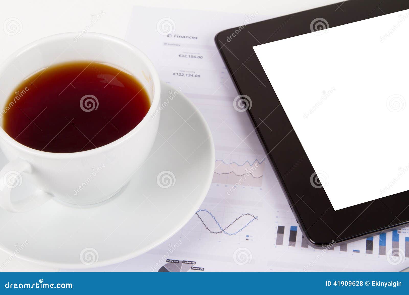 Tablet, Tea on Financial Graph Charts Stock Photo - Image of graph ...