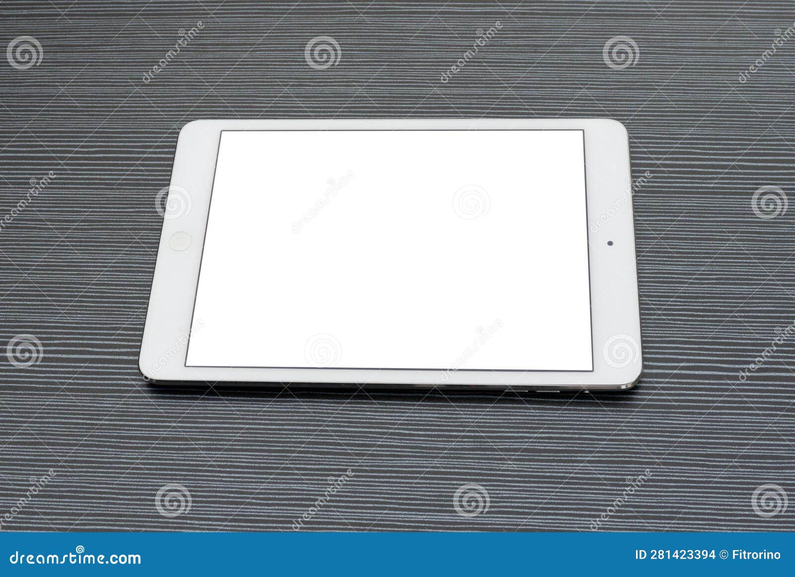 A Tablet with White Screen Isolated on a Textured Table Stock Photo ...