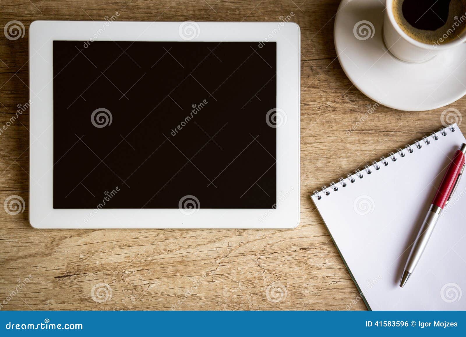 Tablet on wooden table stock photo. Image of gadgets - 41583596