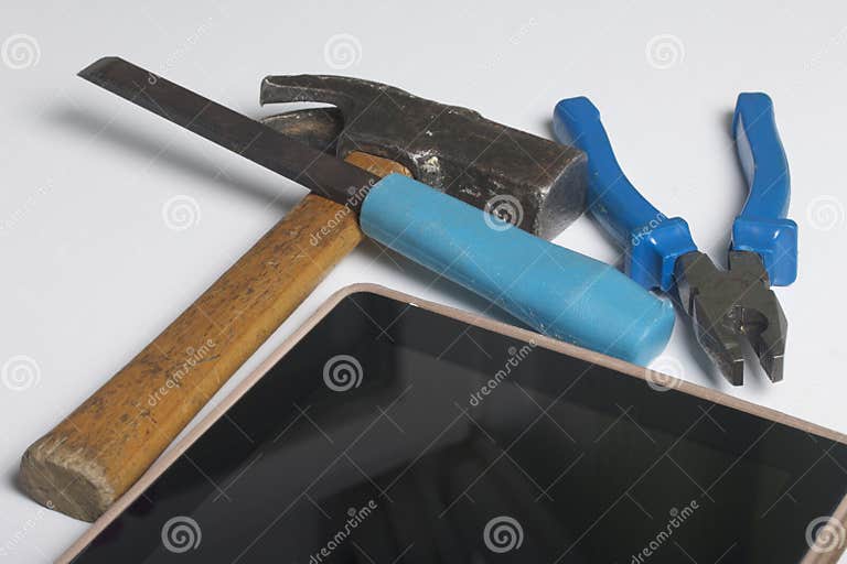 Tablet and Working Tools. on the White Surface of the Table is a Tablet ...