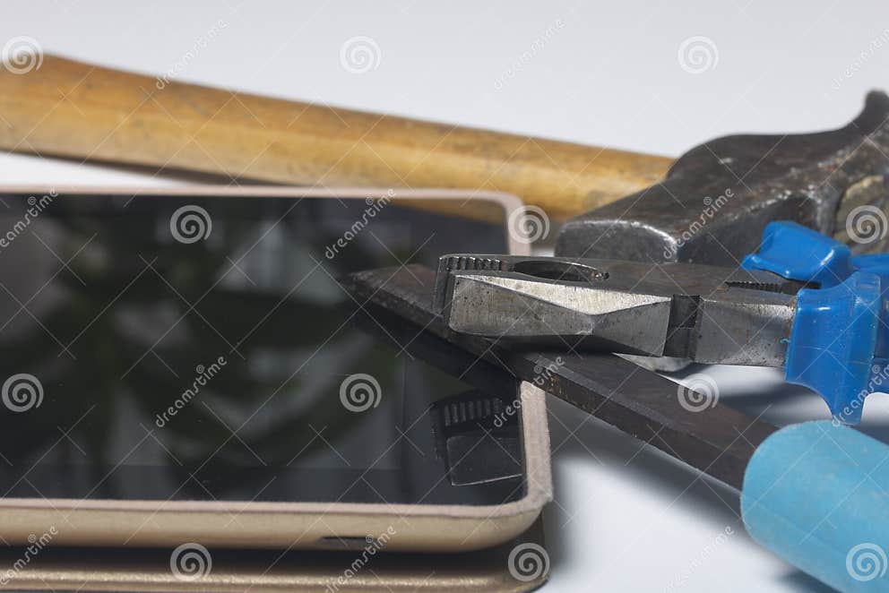 Tablet and Working Tools. on the White Surface of the Table is a Tablet ...